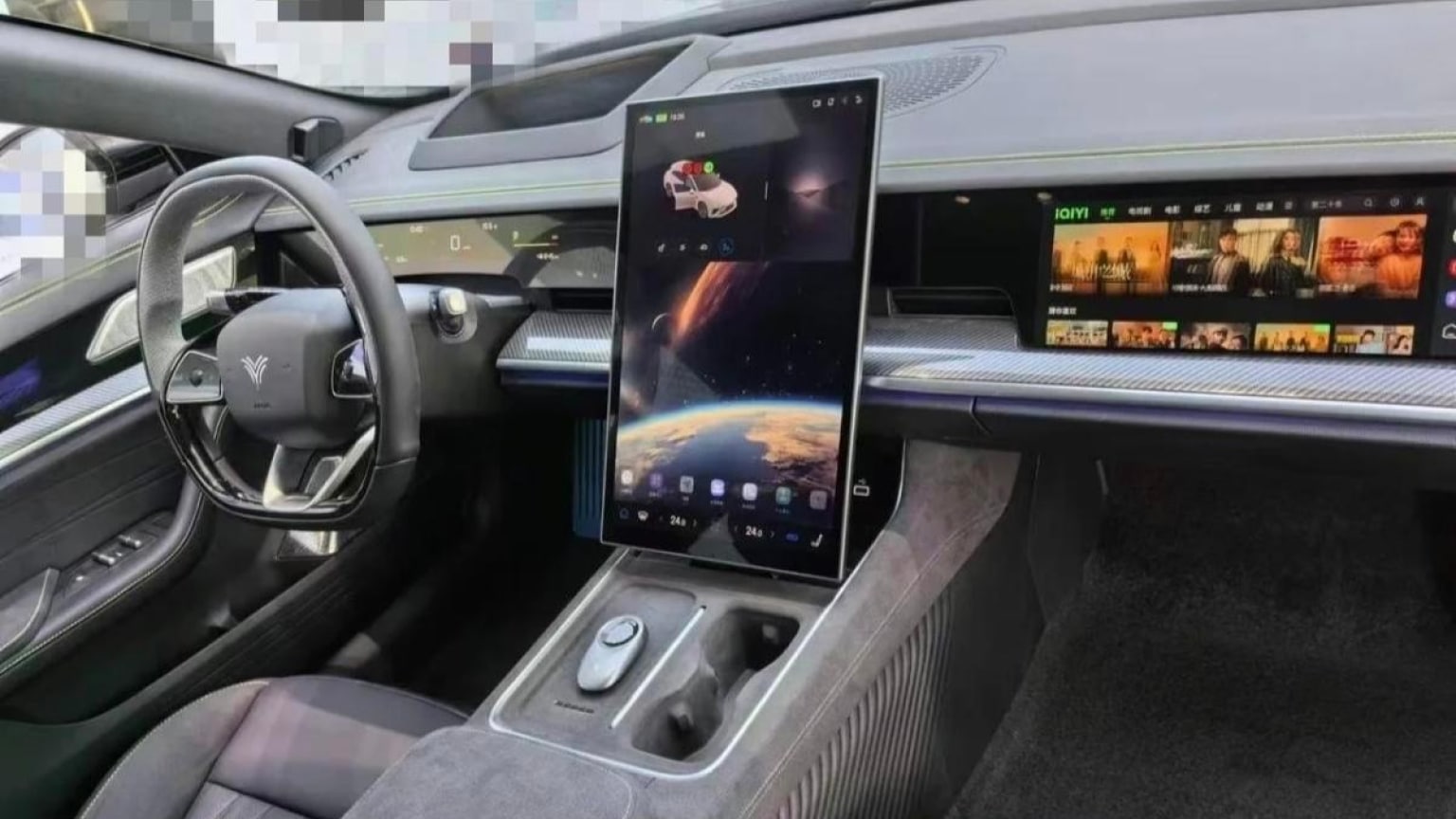 Neta S station wagon fully exposed as it enters China in August